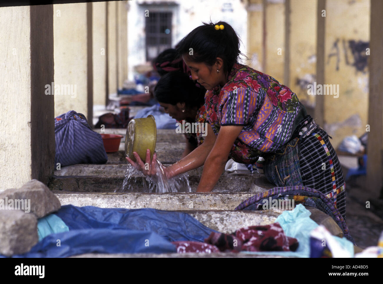 GUATEMALA NATIVE QUICHE WOMEN WASHING CLOTHES HUEHUETENANGO Stock Photo ...