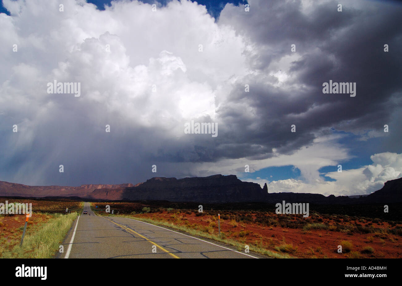 Thunderclouds over a country road, Utah, United States of Amerika Stock ...