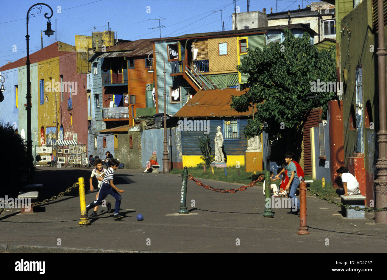 ARGENTINA CHILDREN PLAYING FOOTBALL IN THE CAMINITO STREET OF LA BOCA ...