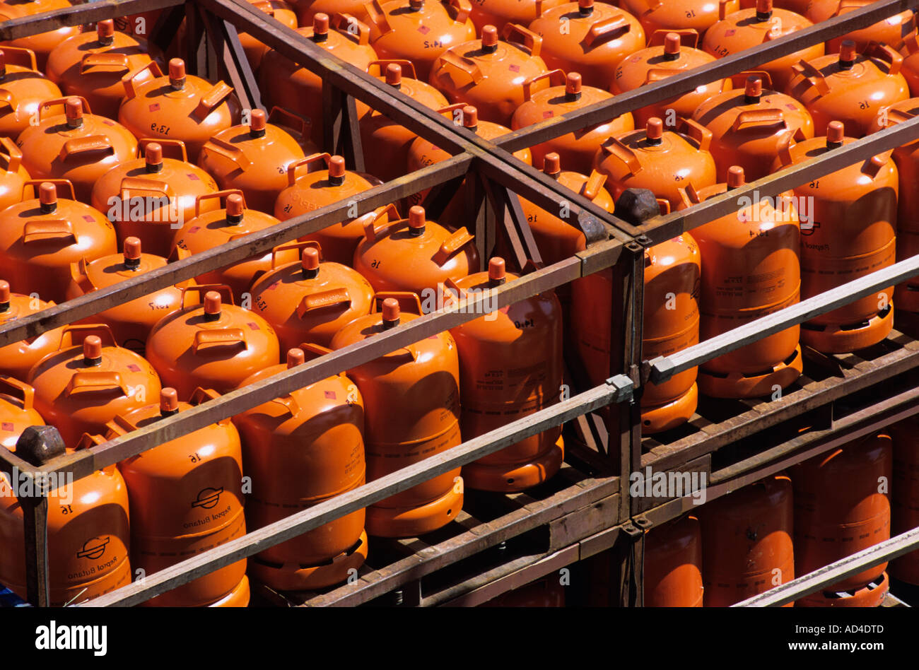 orange gas bottles on the back of a delivery lorry / truck / wagon in ...