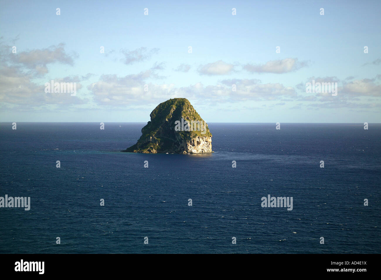 Boulder in the middle of the sea Stock Photo - Alamy