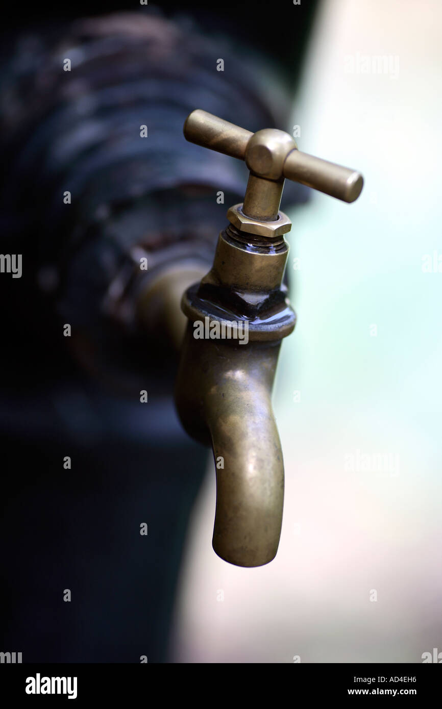 Close-up of a brass water tap Stock Photo - Alamy