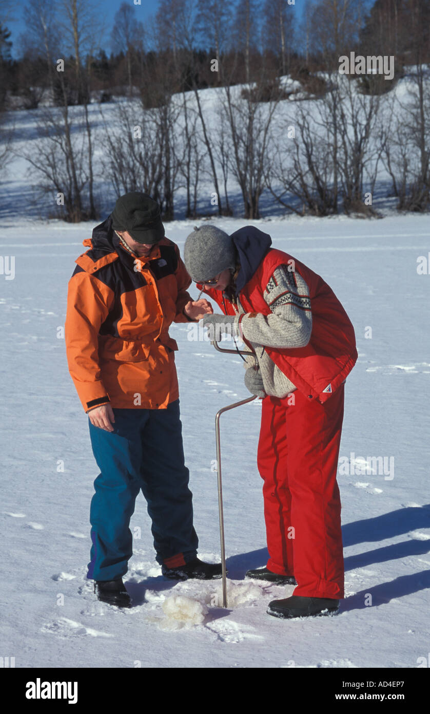 Drilling a hole in the ice hi-res stock photography and images - Alamy