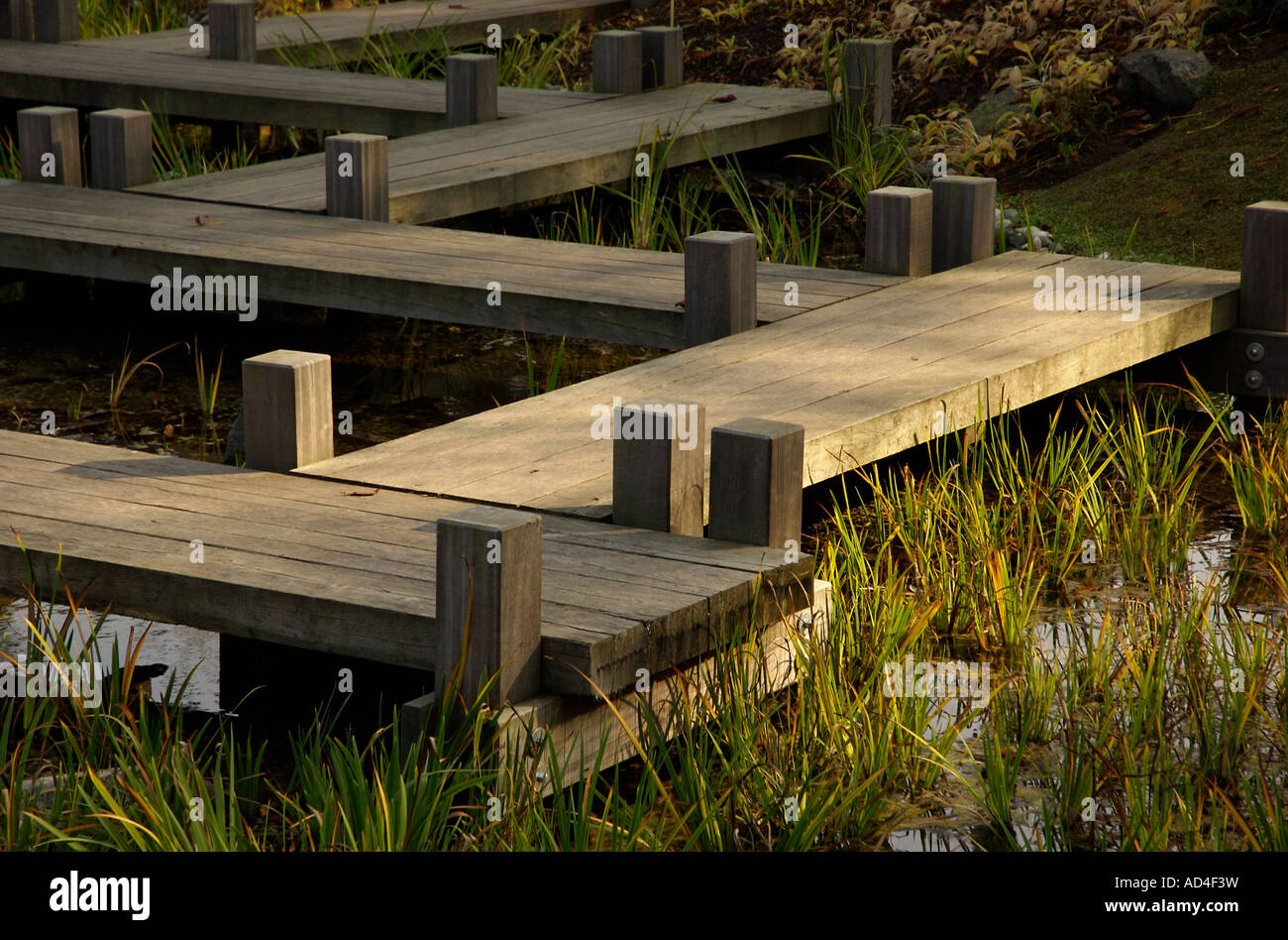 Bridge footpath in a zen garden Stock Photo - Alamy