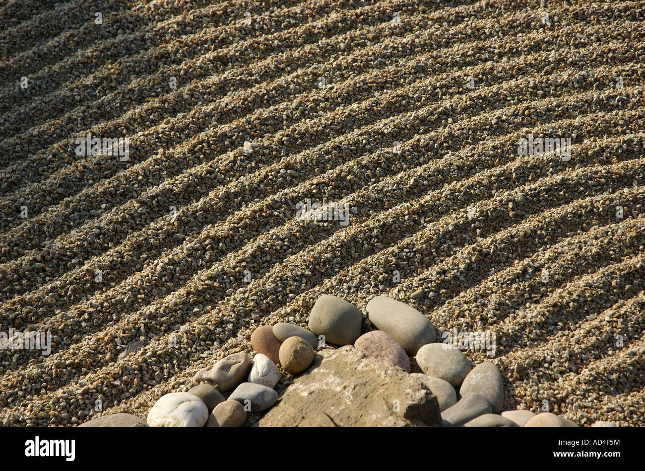 Patterns in a rock garden Stock Photo - Alamy