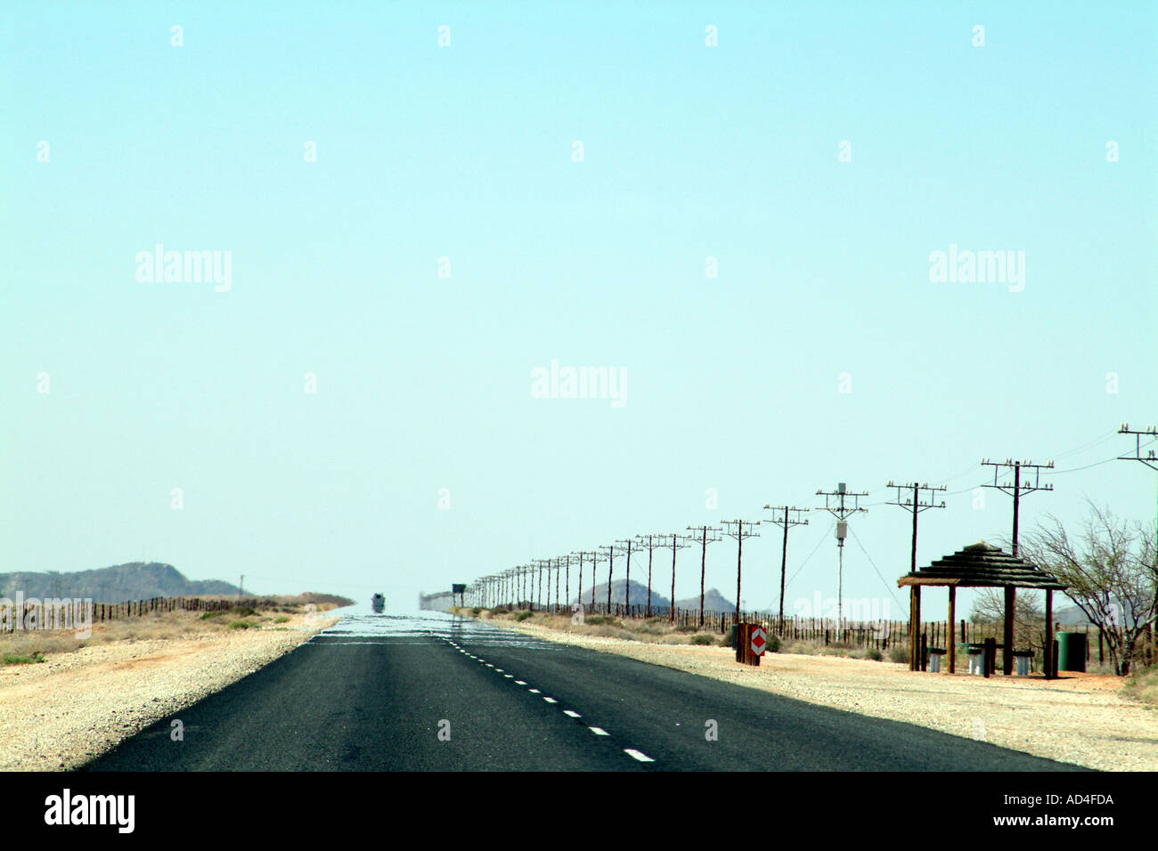 Trans Kalahari Highway with Mirage Namibia Stock Photo - Alamy