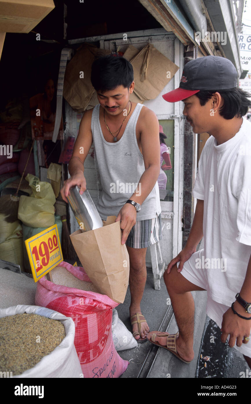 Buying and selling rice in the Philippines Stock Photo - Alamy