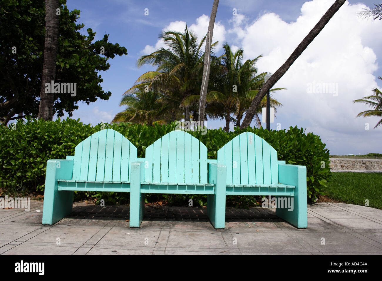 miami beach 3 empty chairs Stock Photo - Alamy