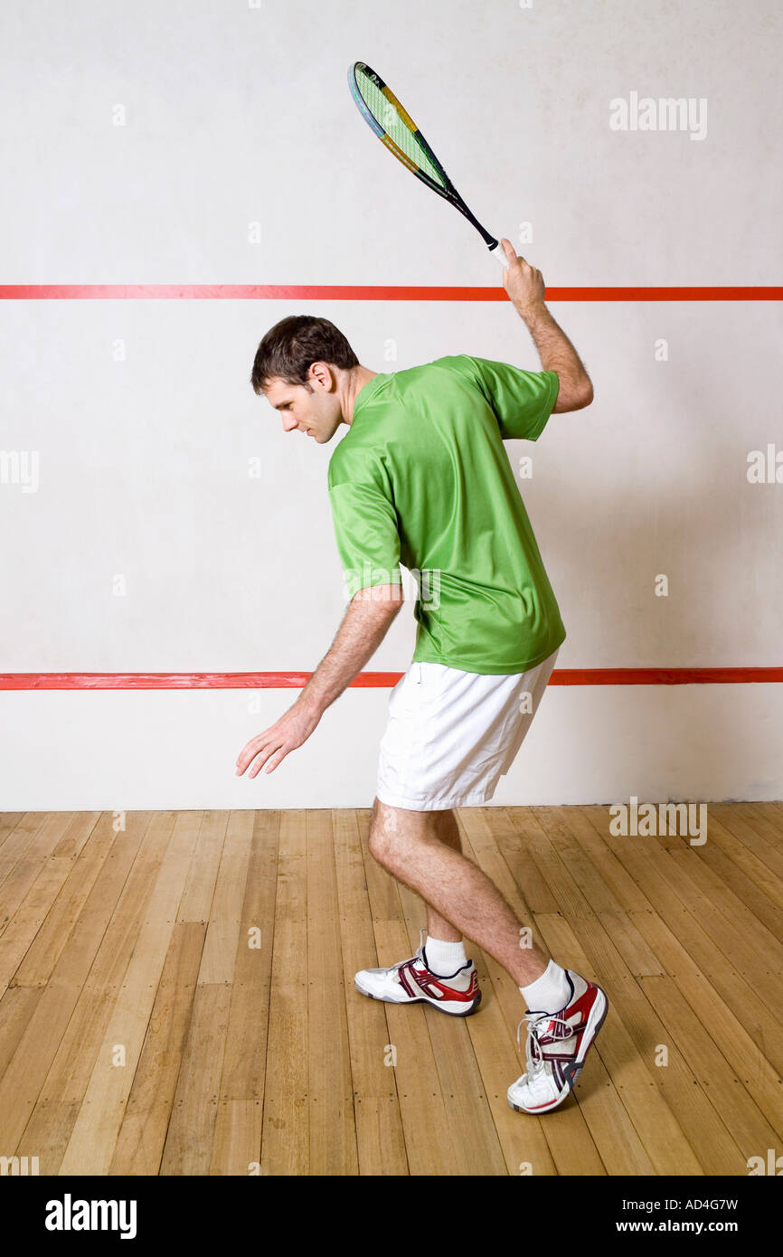 A man playing squash Stock Photo - Alamy