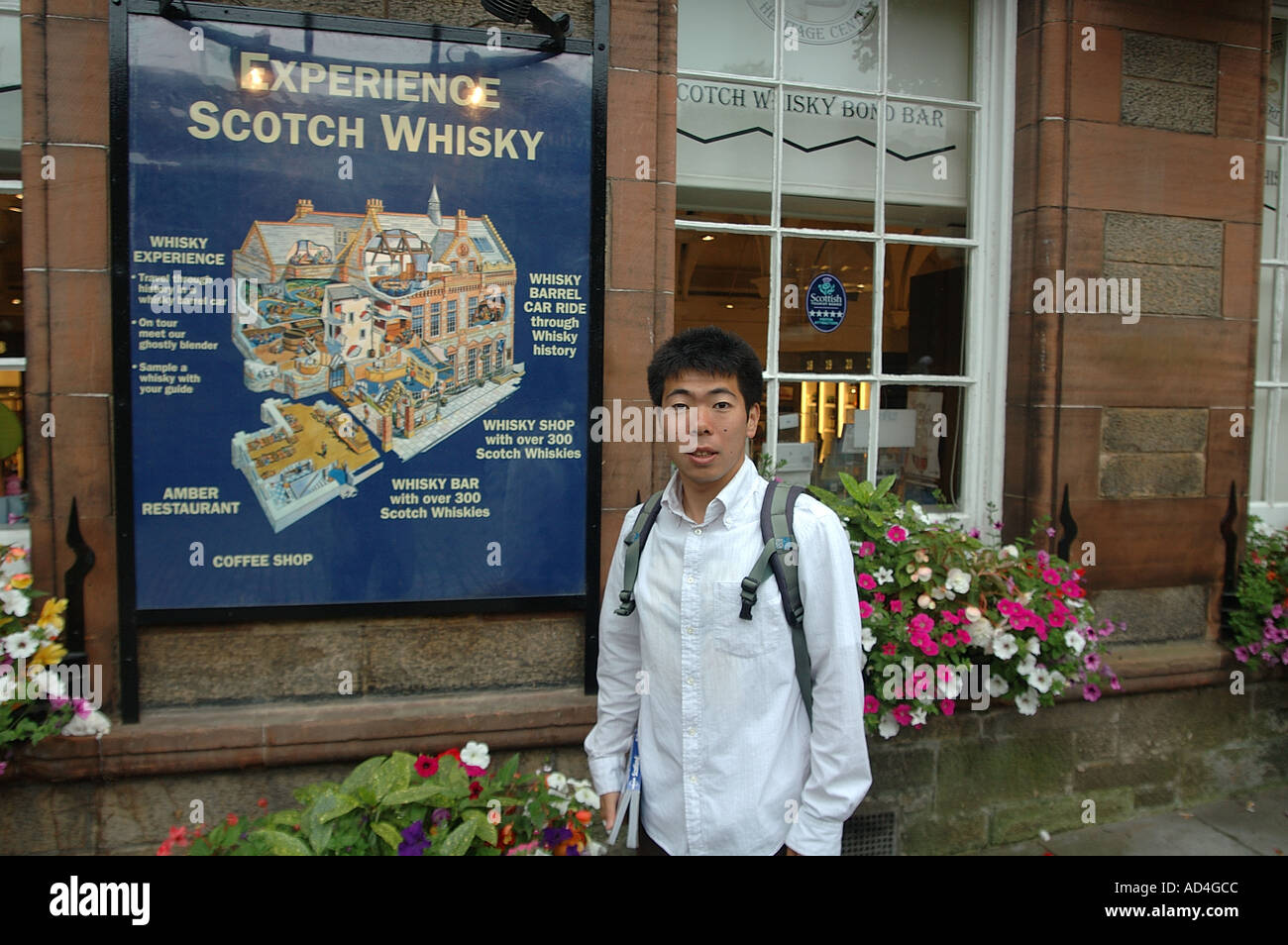 A Japanese visitor to Edinburgh outside the Scottish Whisky Centre ...