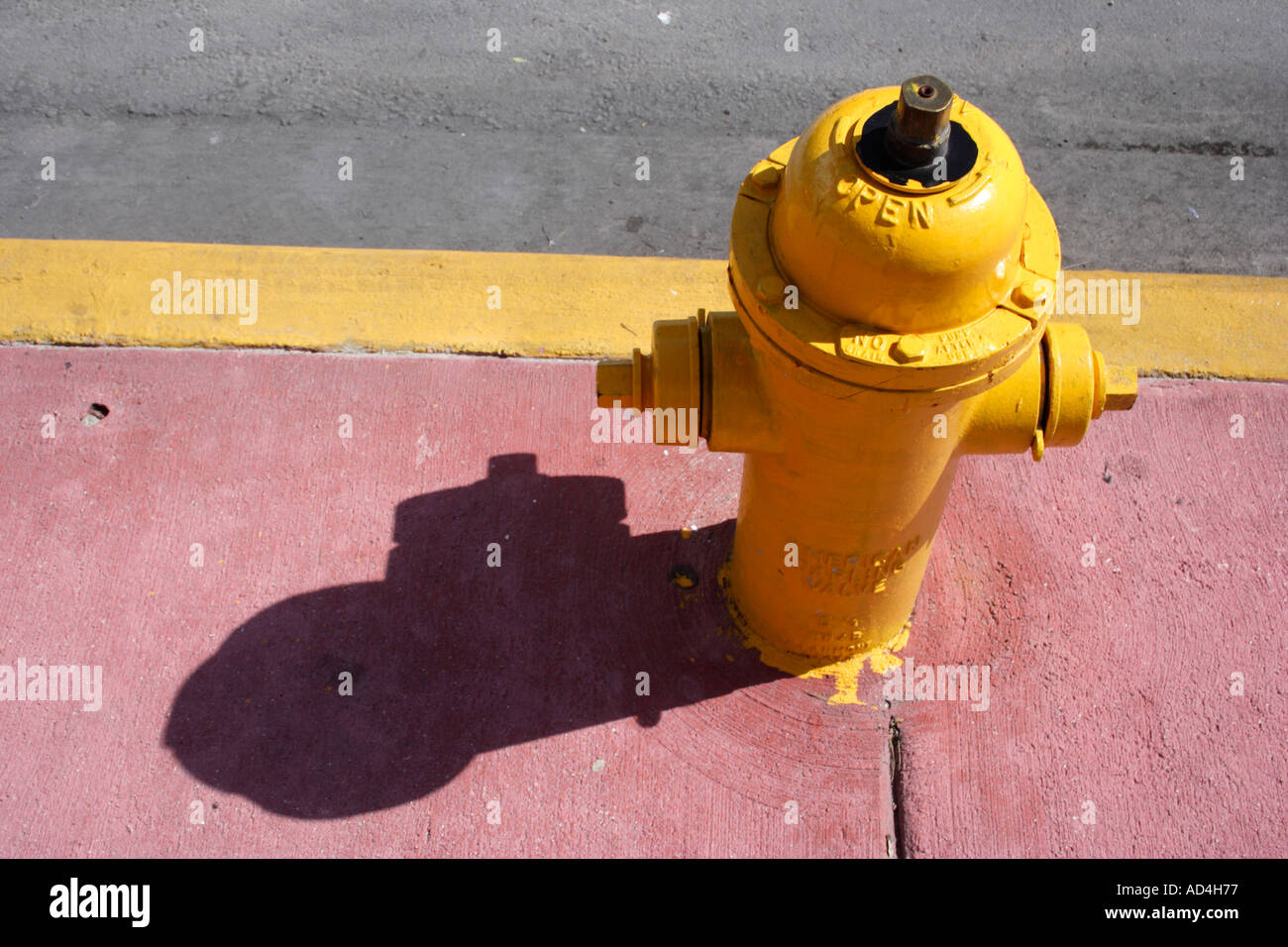 yellow fire hydrant Stock Photo - Alamy