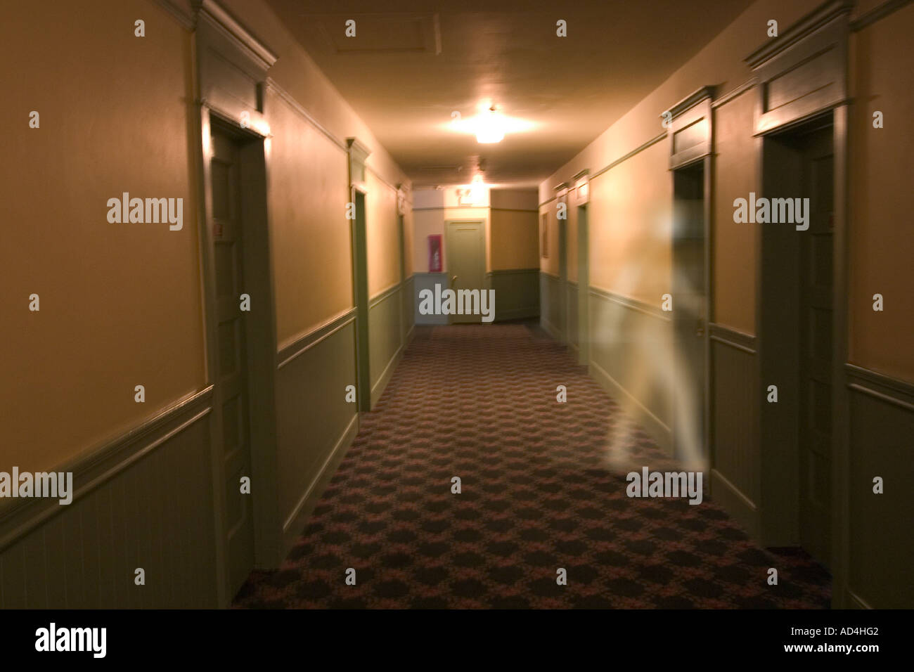 Ghost in hotel hallway Stock Photo - Alamy