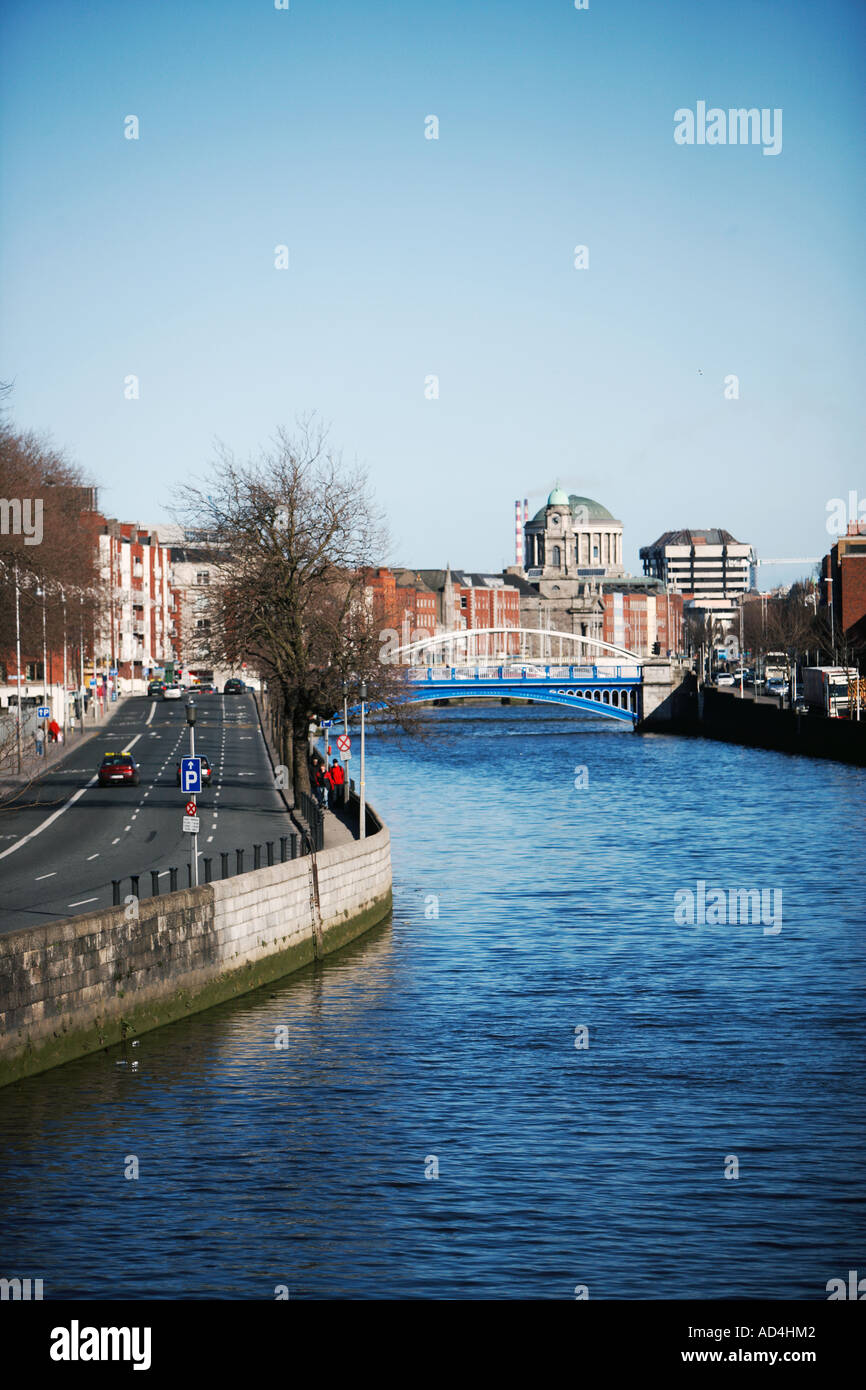 Liffey on Dublins symbol the Halfpenny Bridge Stock Photo - Alamy