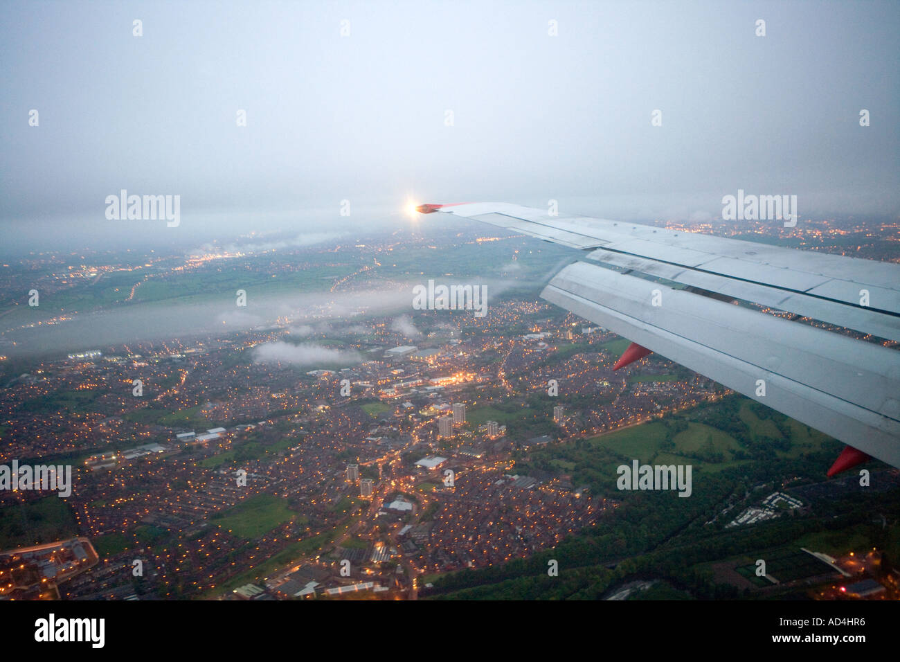 Jet 2 in bad weather landing in dusk Stock Photo - Alamy