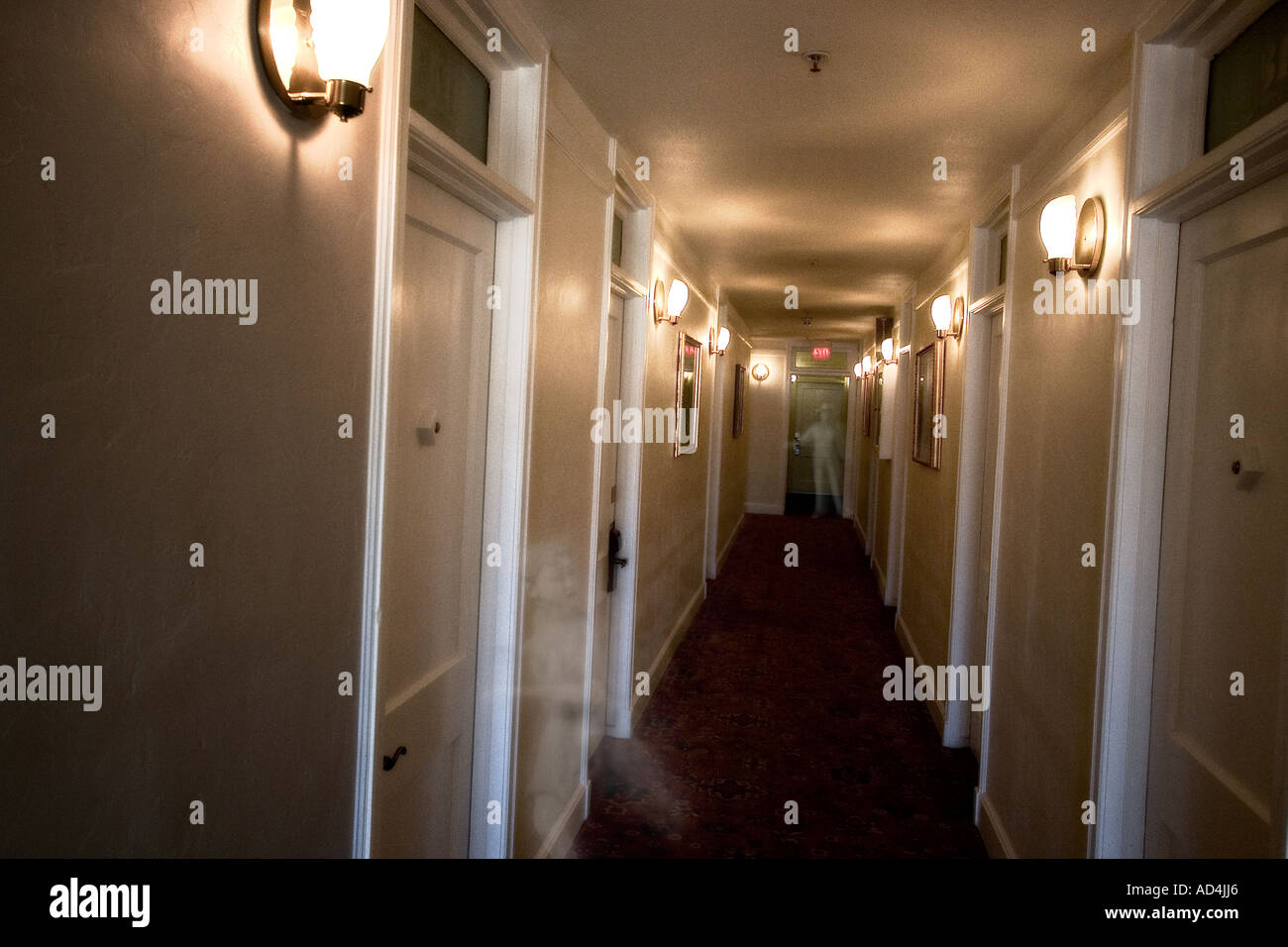 Ghost in hotel hallway Stock Photo - Alamy