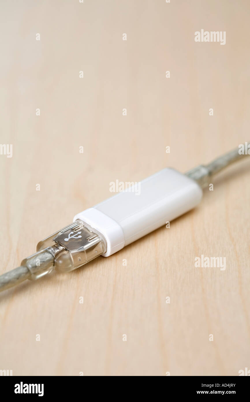 USB cable connected to an extension cord Stock Photo - Alamy