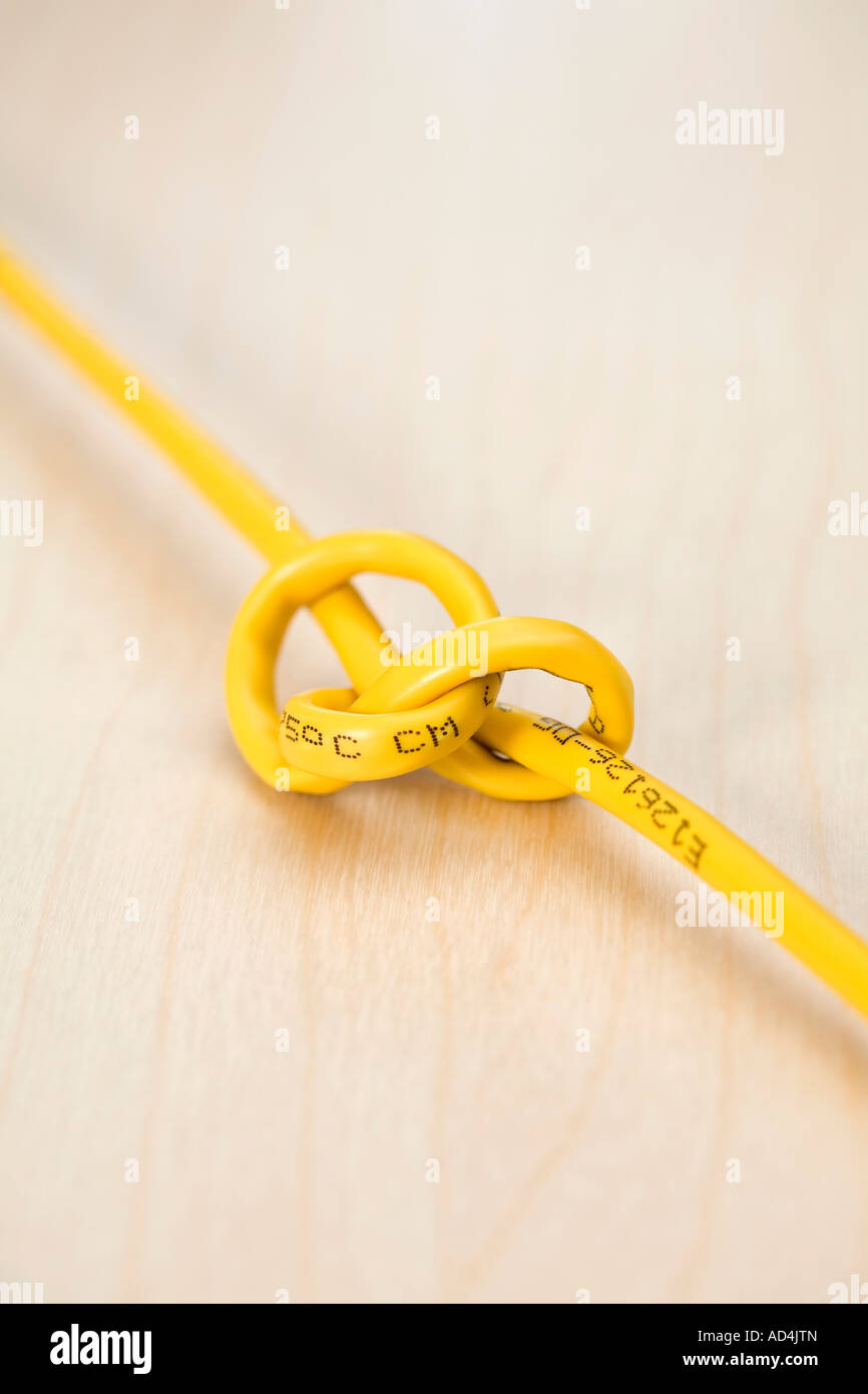 A knotted network connection cable Stock Photo - Alamy