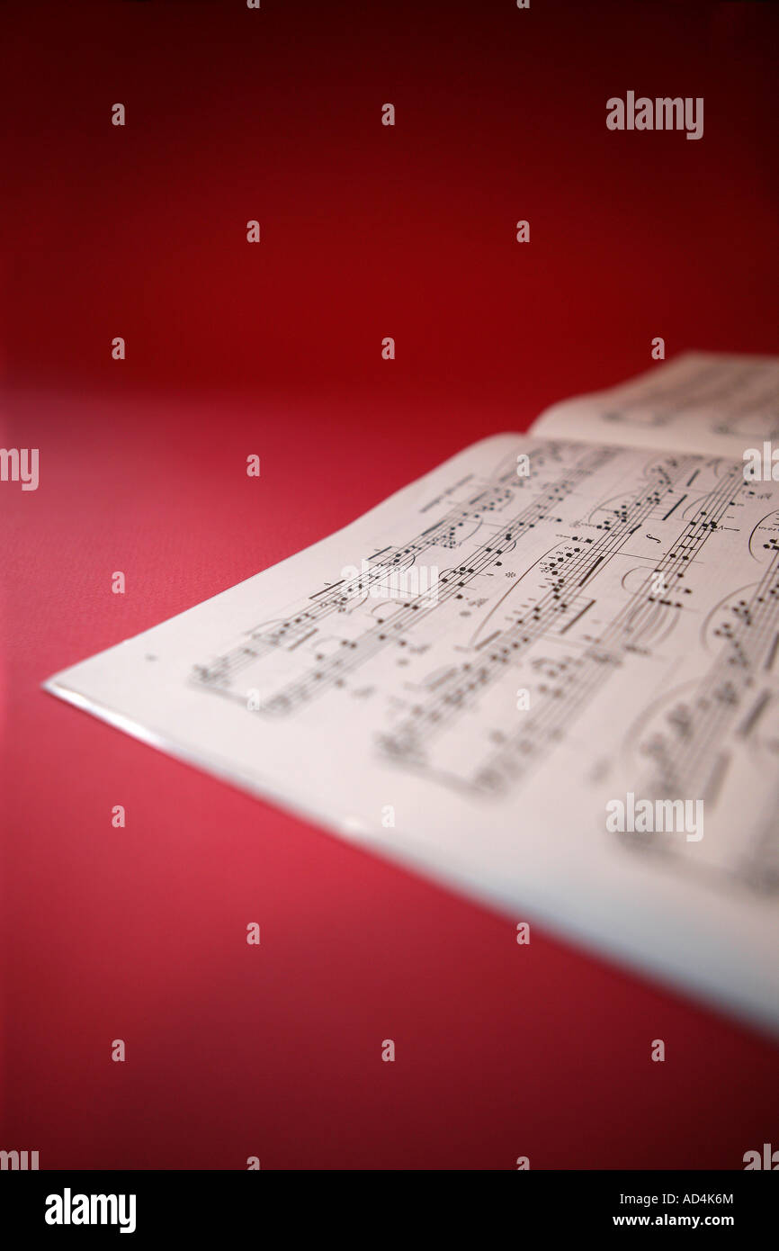 Musical instruments music sheets hi-res stock photography and images ...