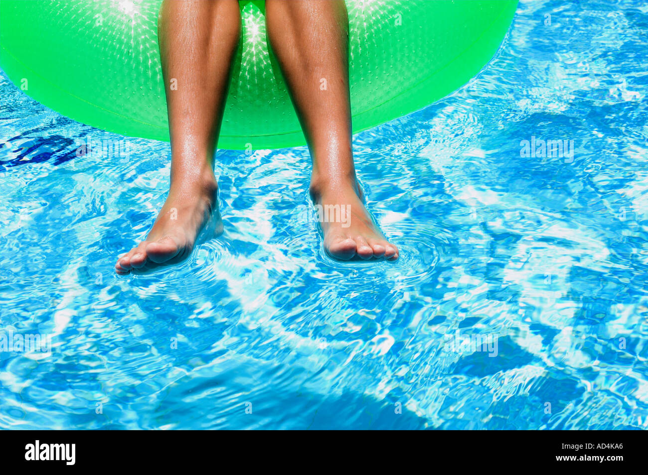 legs on the floater Stock Photo - Alamy