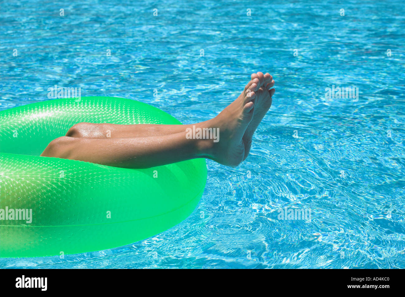 legs on the floater Stock Photo - Alamy