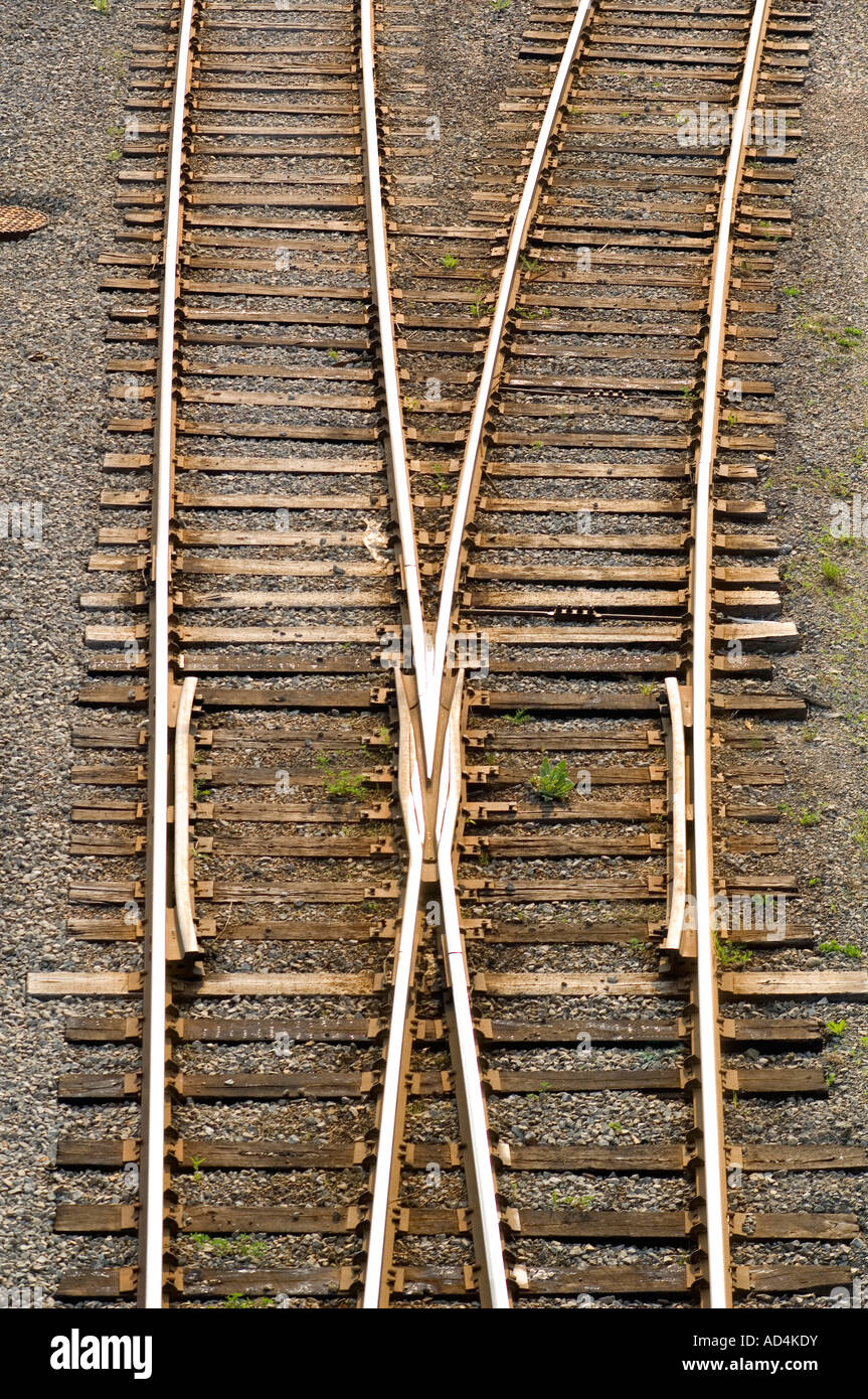 Set of two converging train tracks Stock Photo - Alamy
