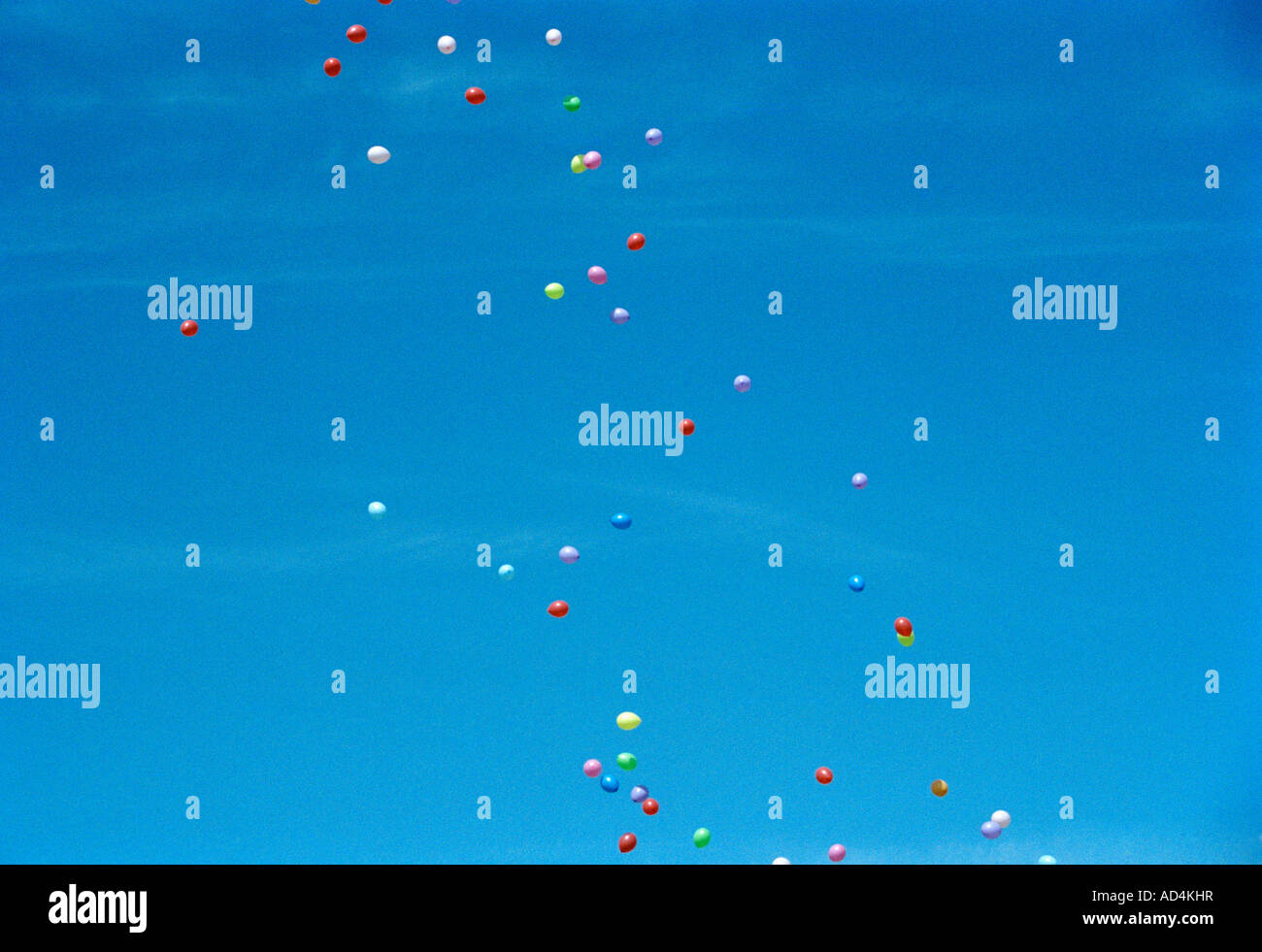 Colored balloons floating in the sky Stock Photo - Alamy