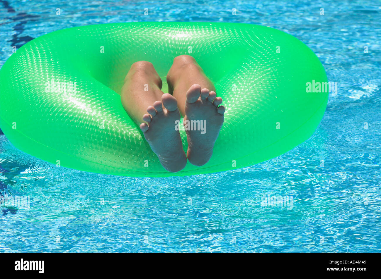 legs on the floater Stock Photo - Alamy