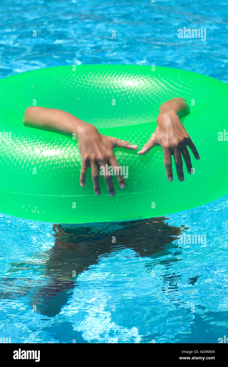 boy underwater holding floater Stock Photo - Alamy