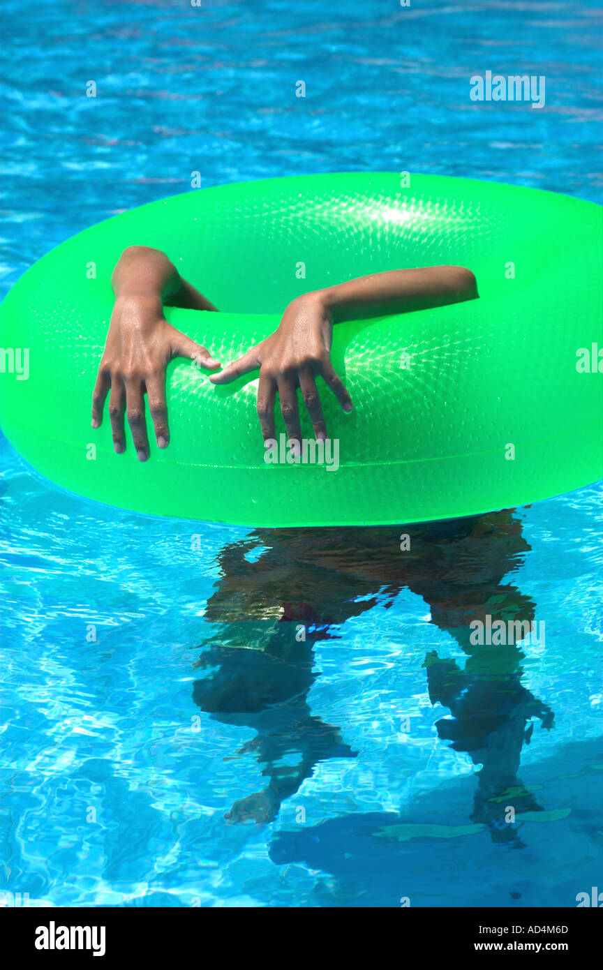 boy underwater holding floater Stock Photo - Alamy