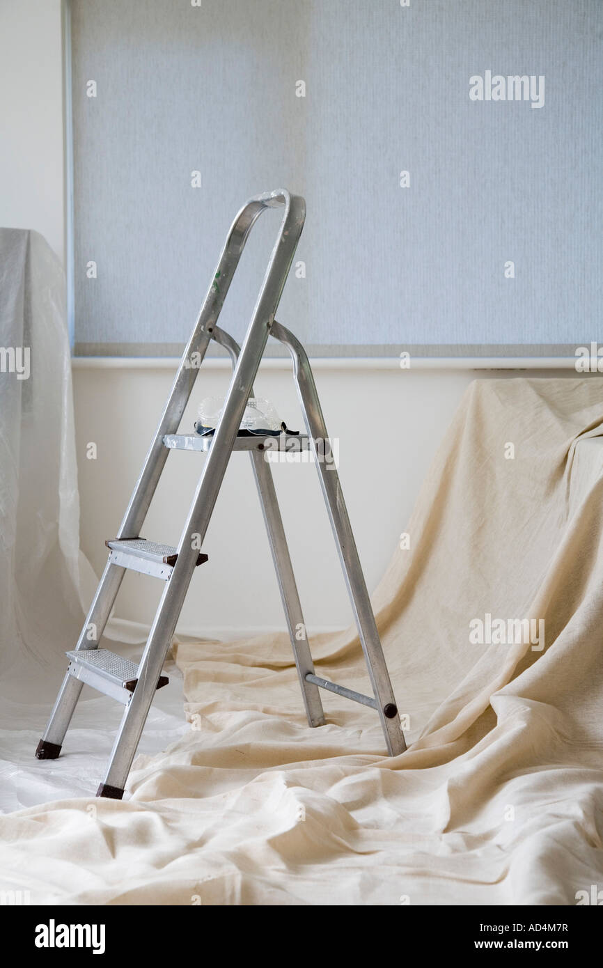 A step ladder and protective sheet Stock Photo - Alamy