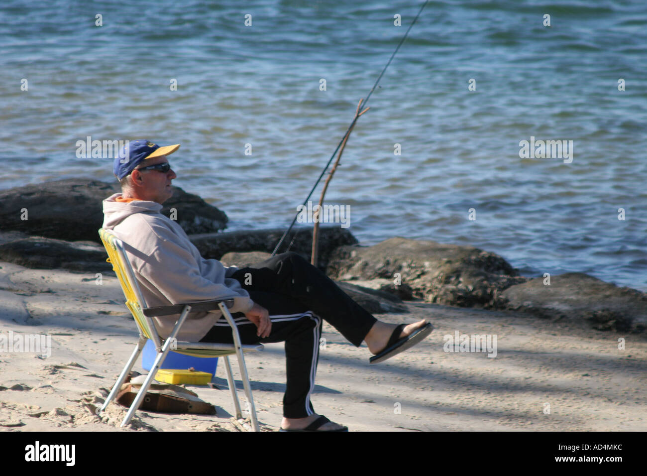 Ade 291 Fishing from beach Stock Photo - Alamy
