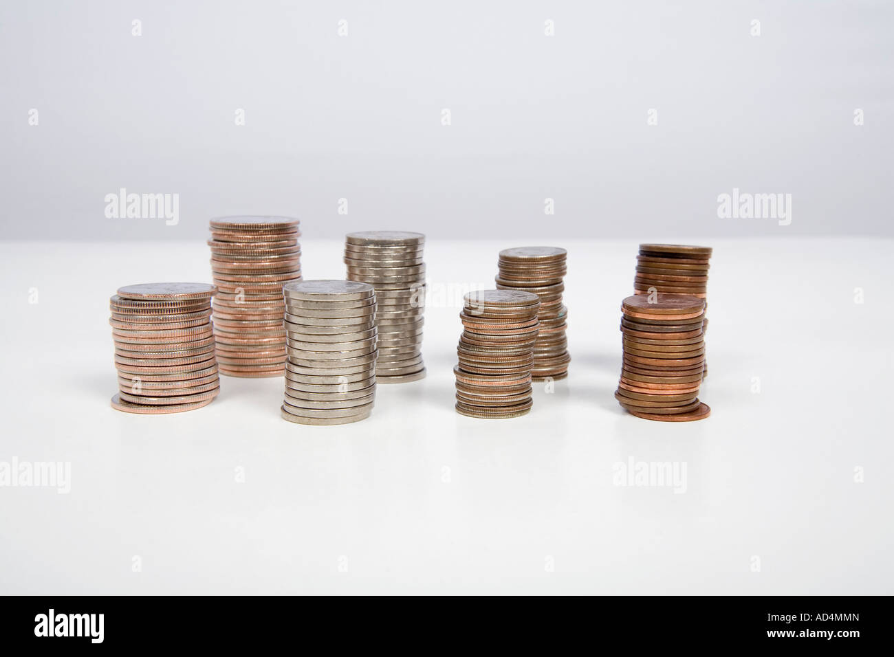 Stacks of coins Stock Photo - Alamy