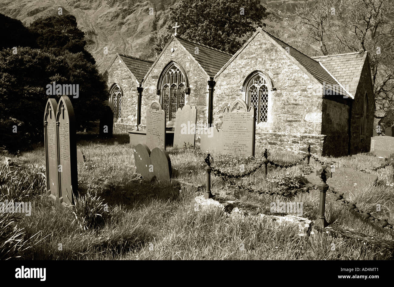 Graves in the churchyard of the church in the village of Nant Peris in ...