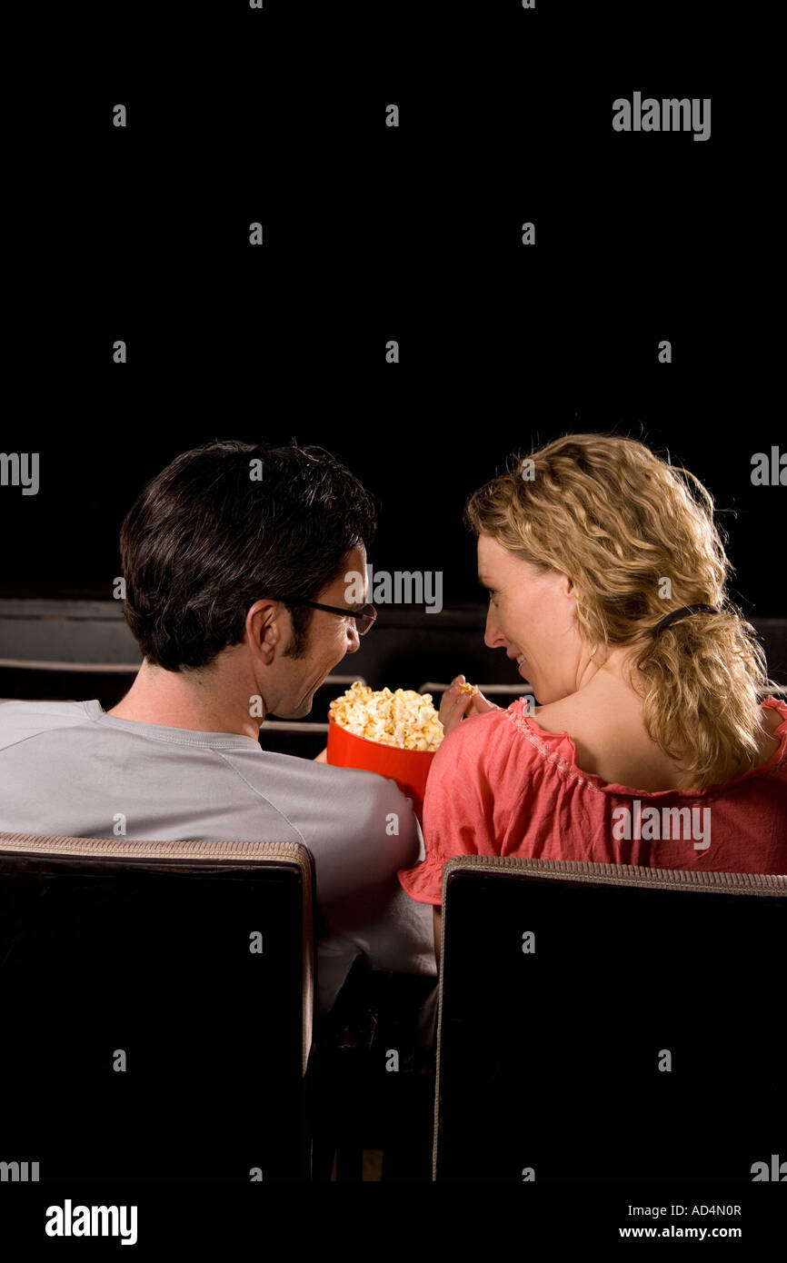 Rear view people sitting in a cinema hi-res stock photography and ...
