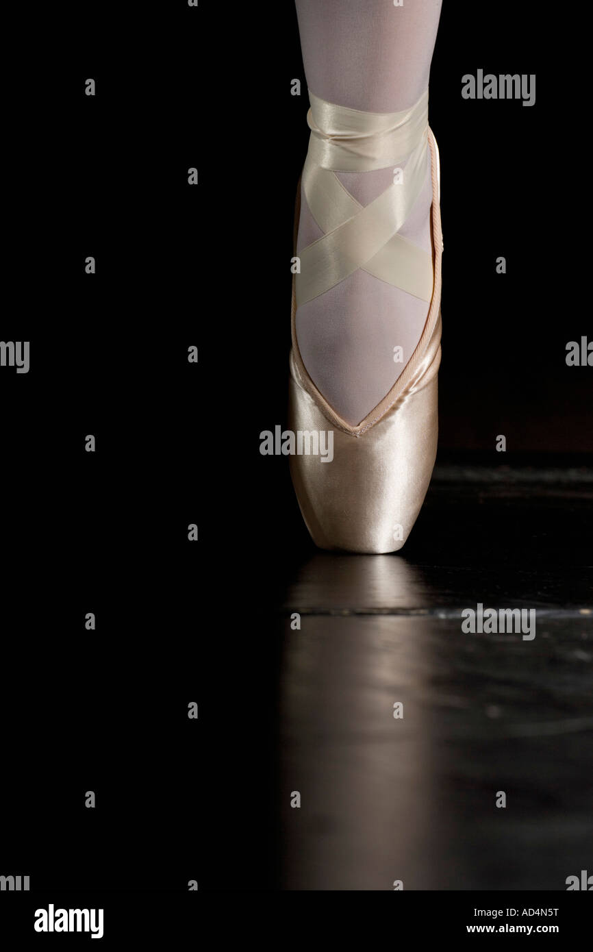 A ballerina balancing on tiptoe Stock Photo - Alamy