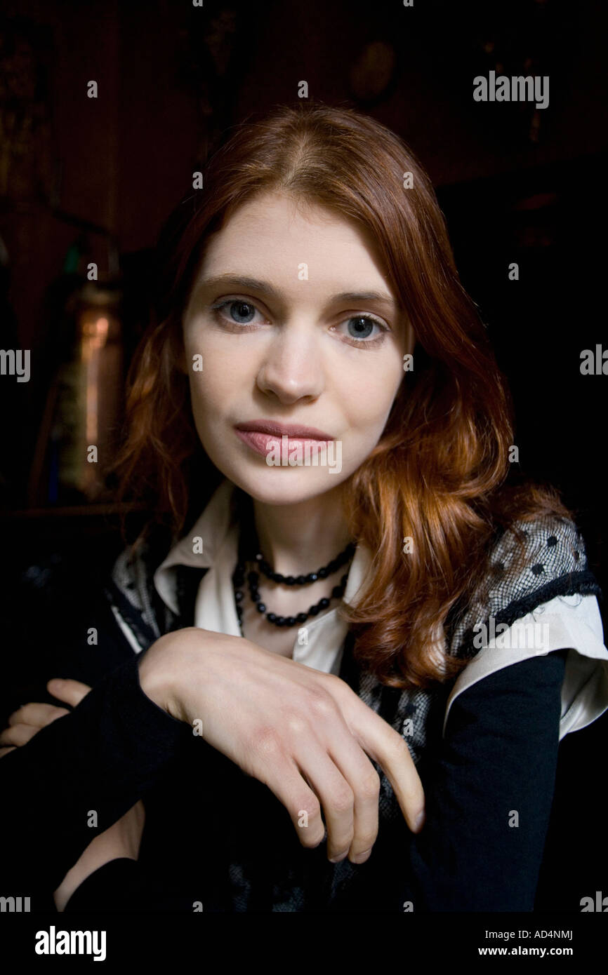Woman arms crossed above head hi-res stock photography and images - Alamy