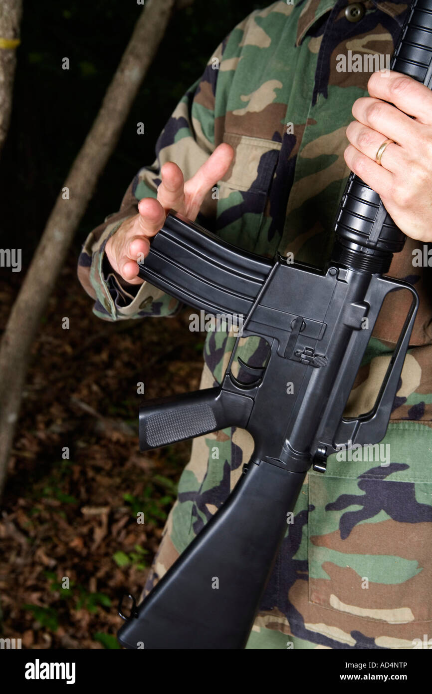 Army soldier standing war holding rifle tree hi-res stock photography ...