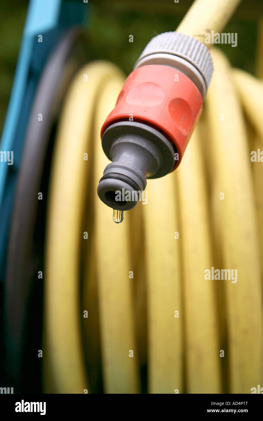 Water dripping from a garden hose Stock Photo - Alamy