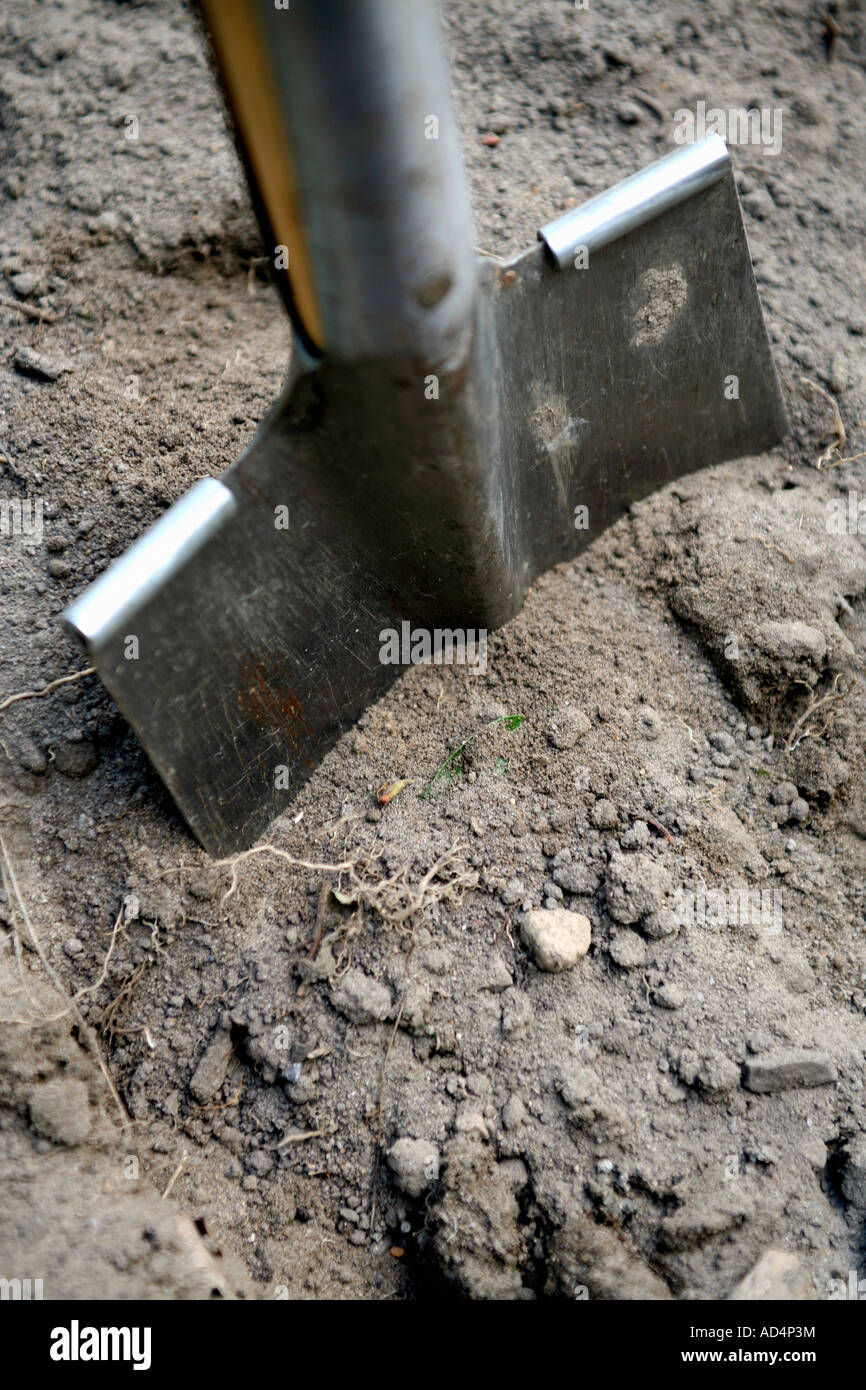 Shovel stuck in dirt hi-res stock photography and images - Alamy