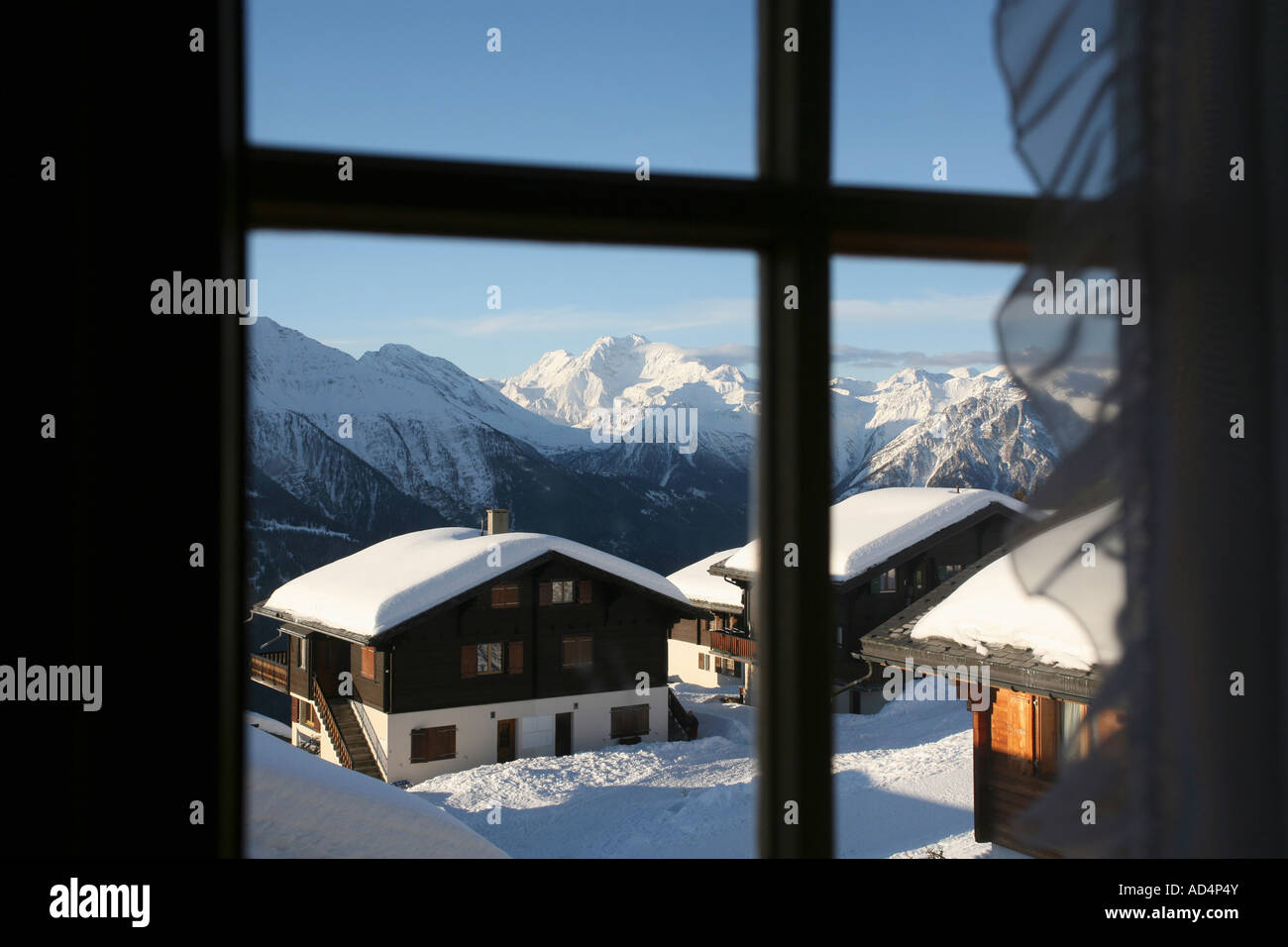 View through a window of a ski resort Stock Photo - Alamy