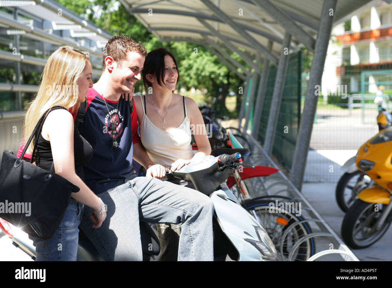 Students on a motorcycle Stock Photo - Alamy