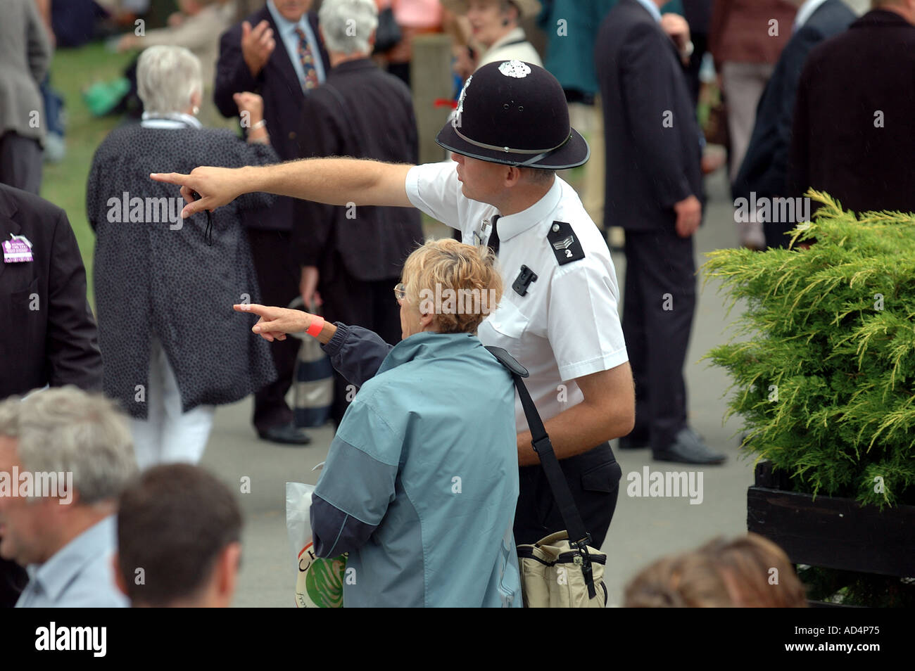 Police with public helping uk hi-res stock photography and images - Alamy