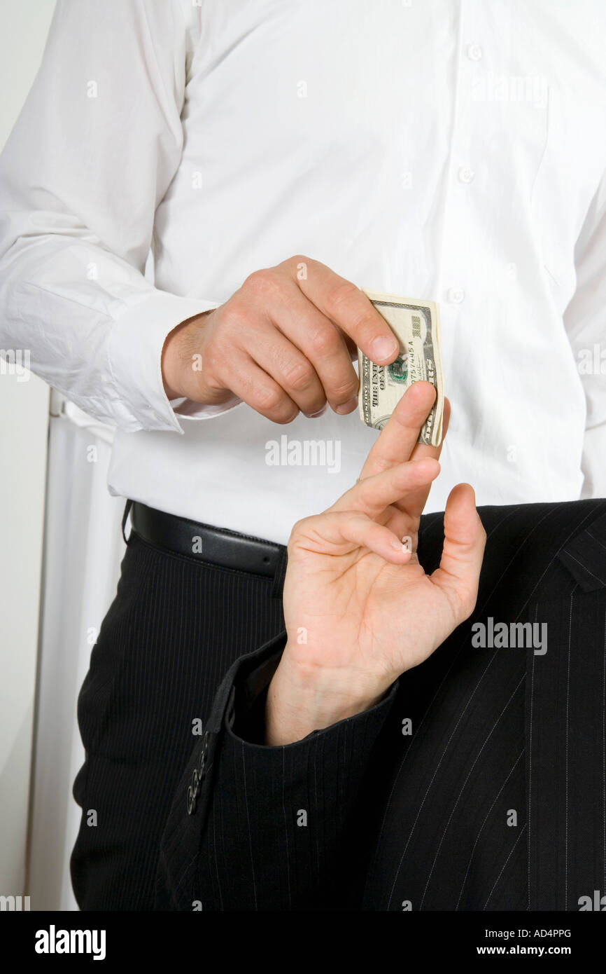 Tipping the waiter Stock Photo - Alamy