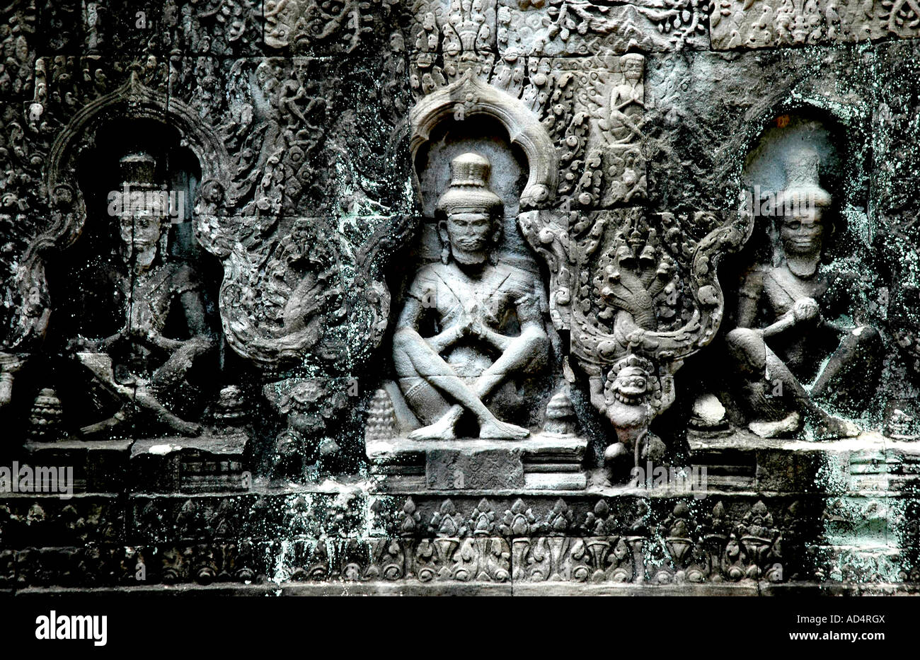 Temple engraving on Angkor temple Stock Photo - Alamy
