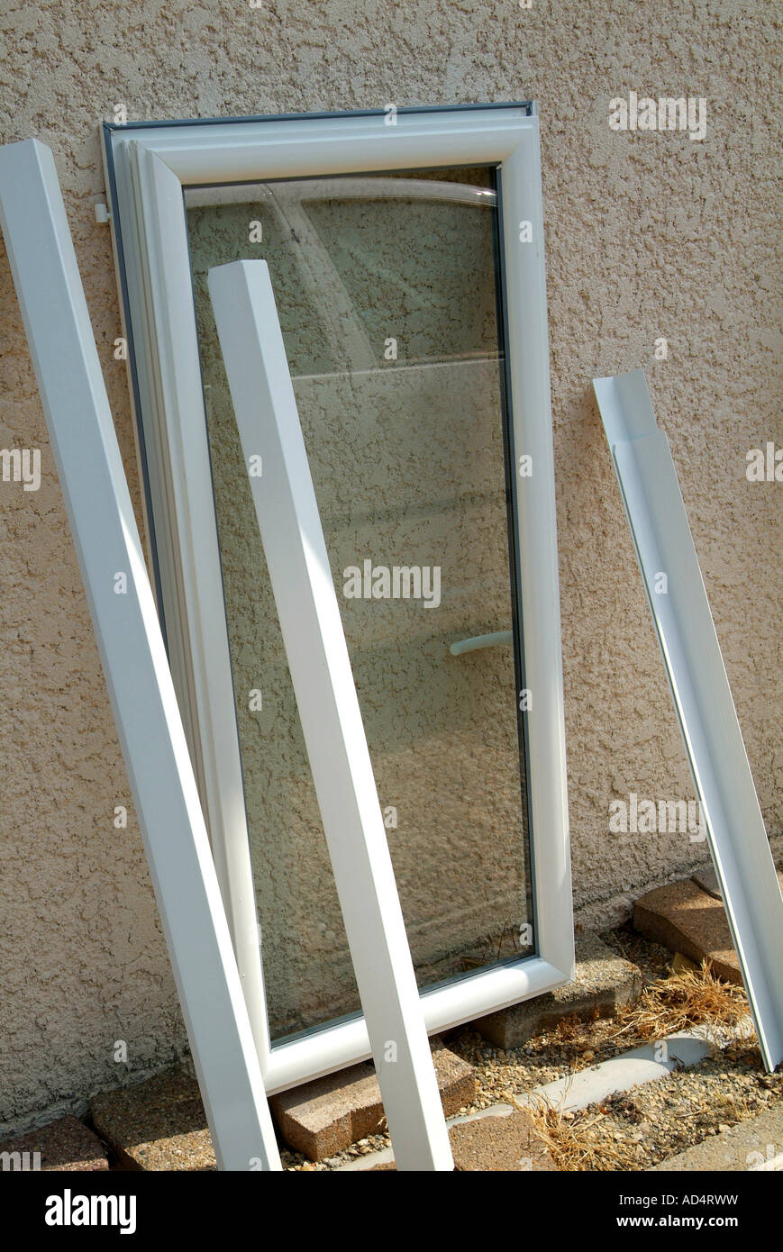 Window frame next to a wall Stock Photo - Alamy