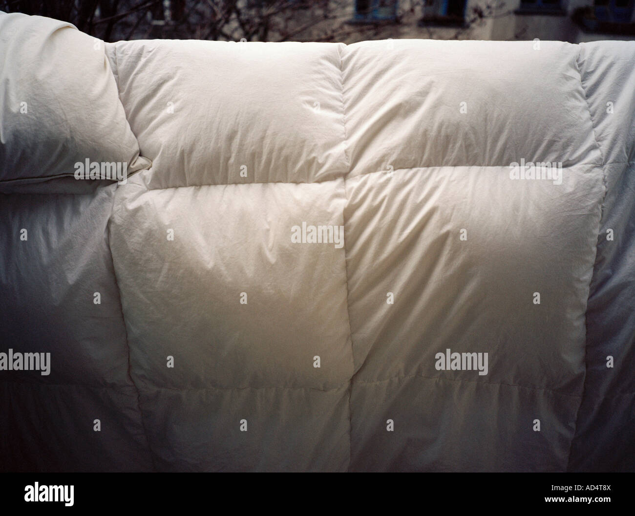 A quilt hanging on a washing line Stock Photo - Alamy