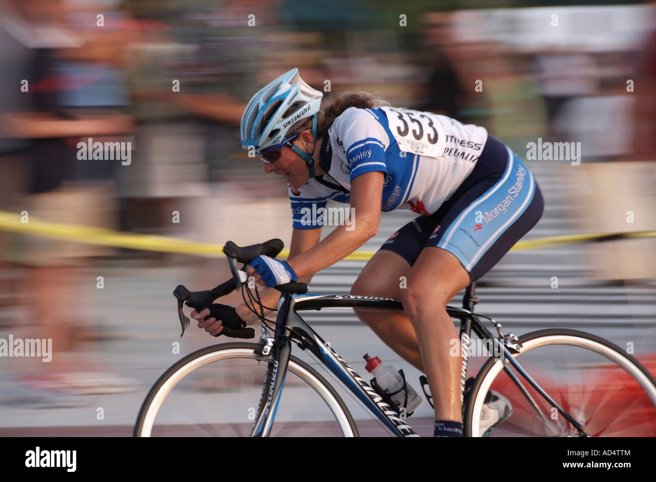 A young bicyclist lady on a fast moving bike Stock Photo - Alamy