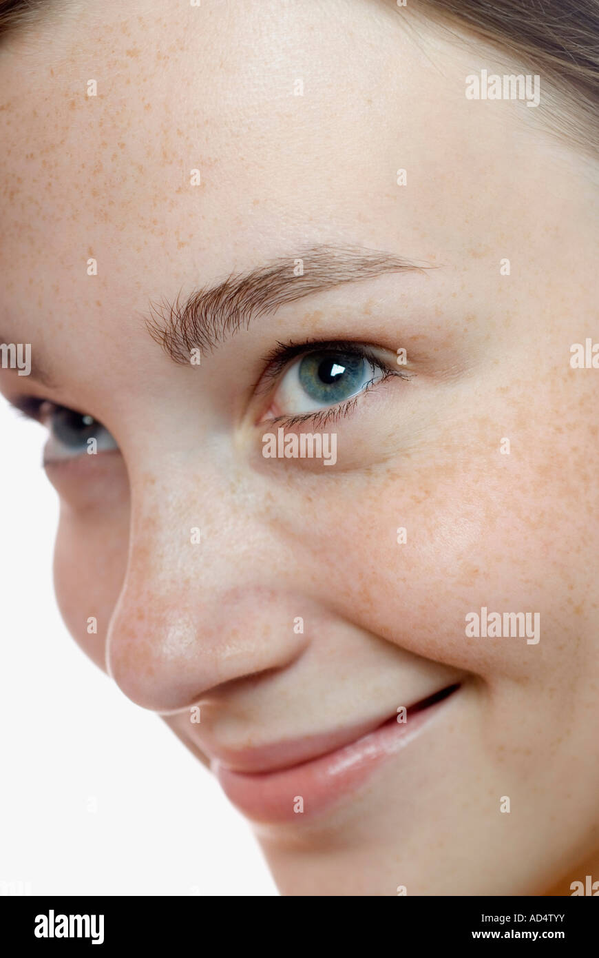 A young woman looking up and smiling Stock Photo - Alamy