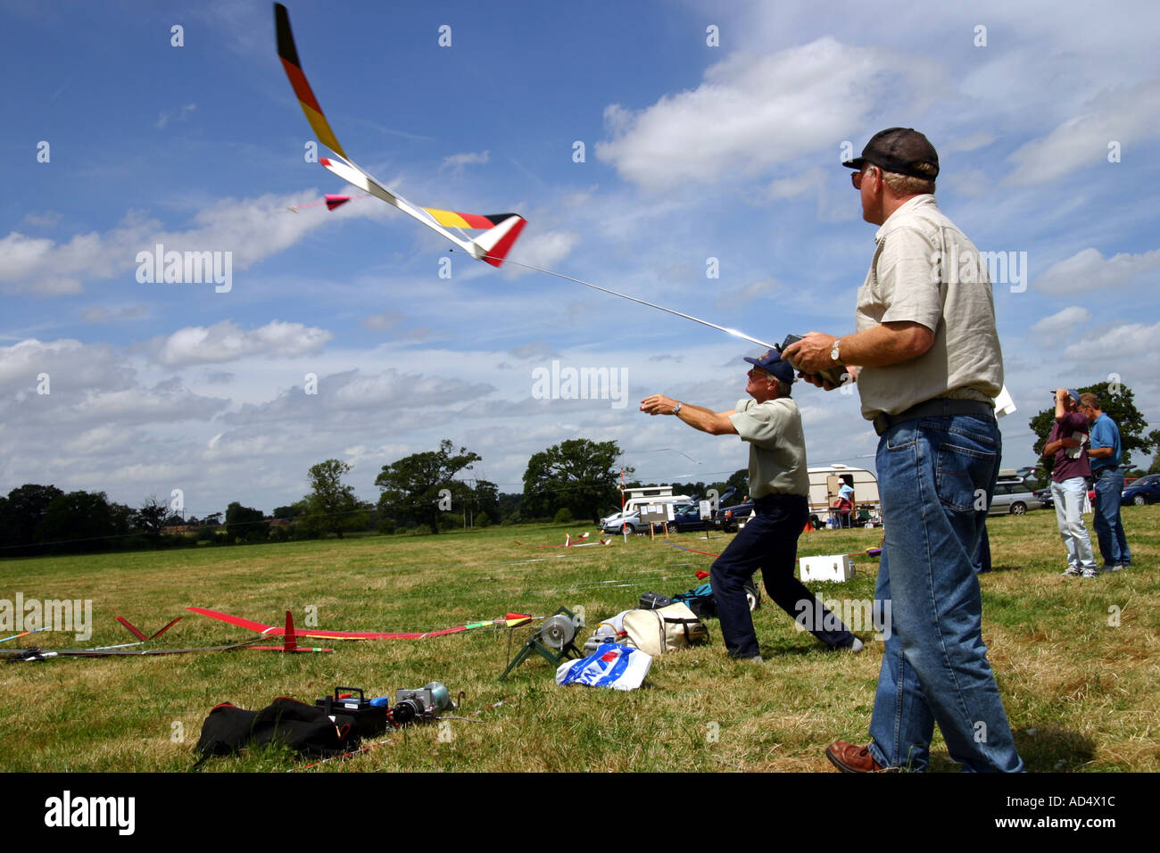 men flying model radio control gliders at a competition at Upton ...