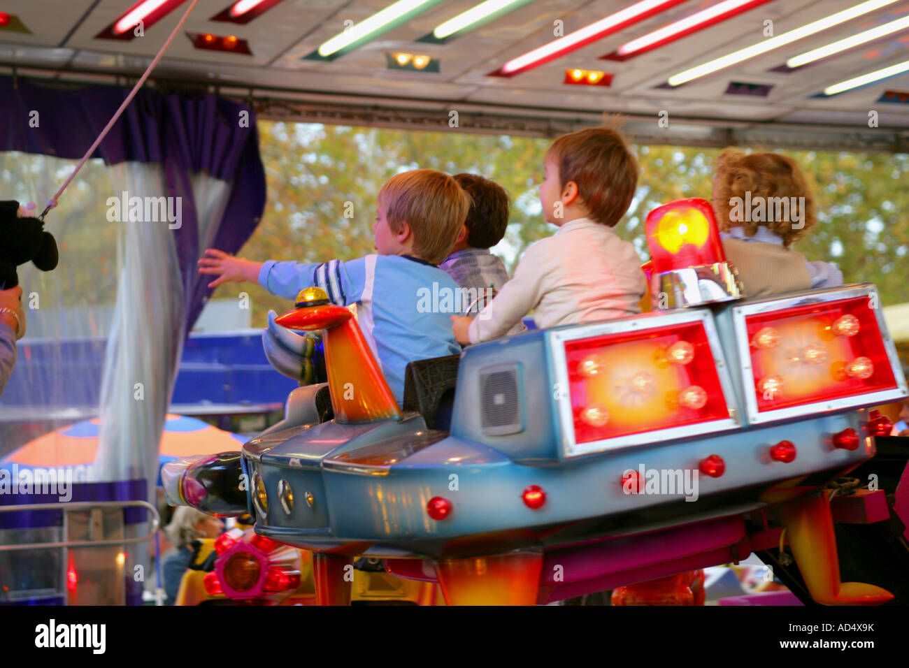 Children at the fun fair Stock Photo - Alamy